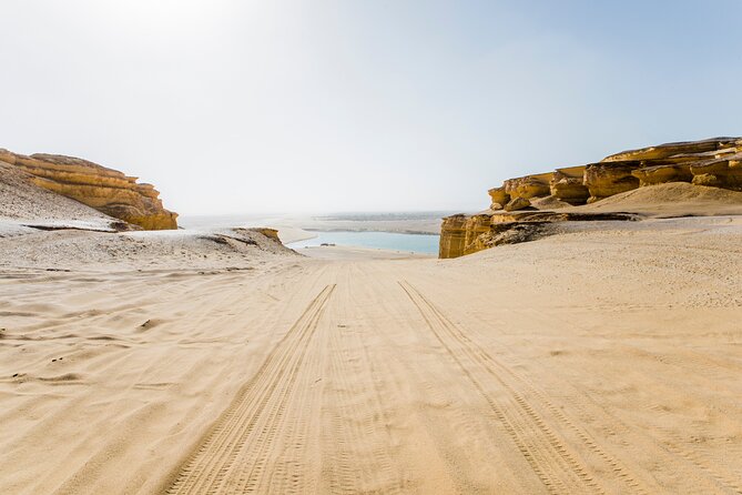 From Cairo: Desert Safari, Waterfalls, Sand Boarding and Camel Ride ...